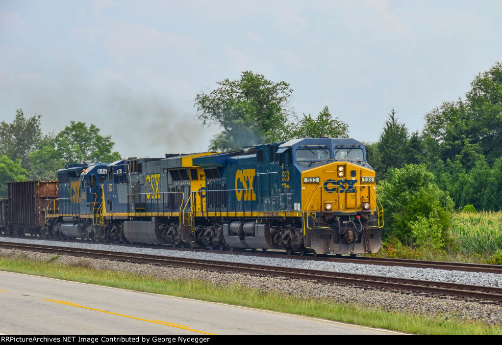 CSX 533, 672 & 8465 are leading a mixed freight train